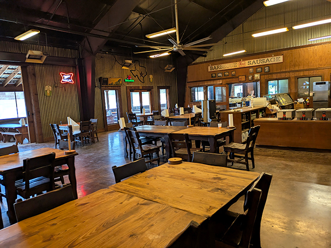No-frills wooden tables and concrete floors set the stage where the real stars—perfectly smoked meats—will soon make their grand entrance.