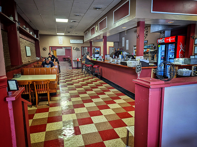 Step inside and the checkerboard floor announces you've found the real deal. This isn't manufactured nostalgia—it's the genuine article that chain restaurants try to imitate.