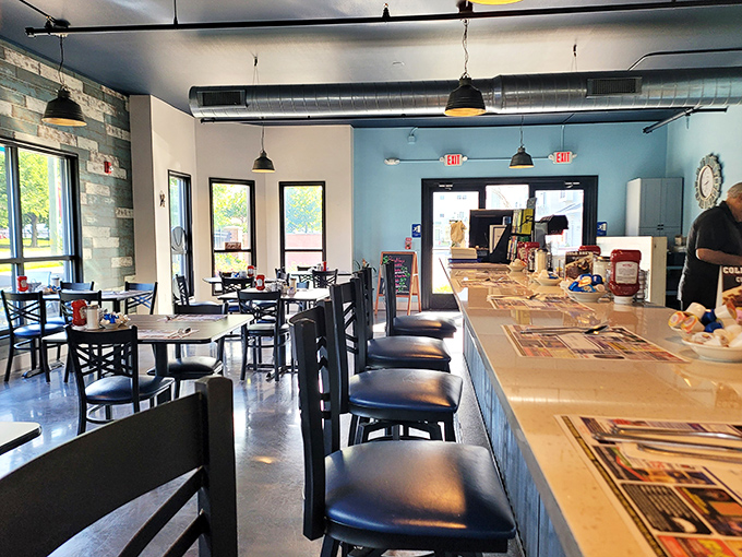 The interior strikes that perfect balance—industrial chic meets hometown comfort, with counter seating that invites solo diners and morning paper readers.