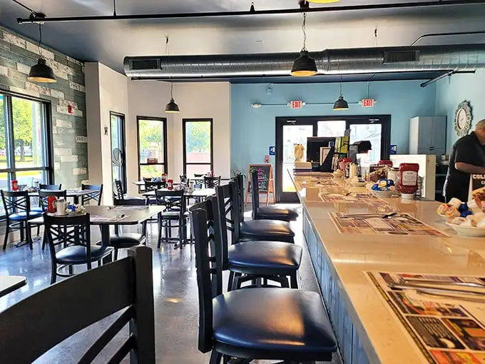 The interior strikes that perfect balance—industrial chic meets hometown comfort, with counter seating that invites solo diners and morning paper readers.