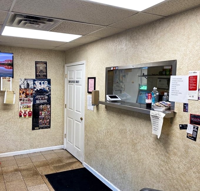 No-frills ordering area where barbecue dreams come true. The simple setup speaks volumes—all the energy goes into what matters: the meat.
