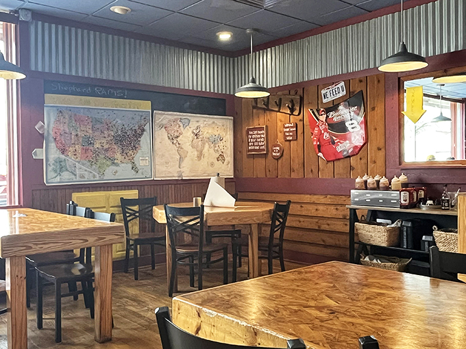 Maps on the walls track barbecue pilgrims who've made the journey to this Springfield shrine. Wood paneling and corrugated metal—the universal language of serious smoke.
