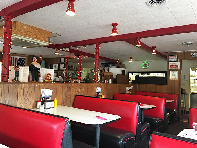Step inside and time travel to the golden age of diners—red vinyl booths, wood paneling, and the promise of comfort food done right.
