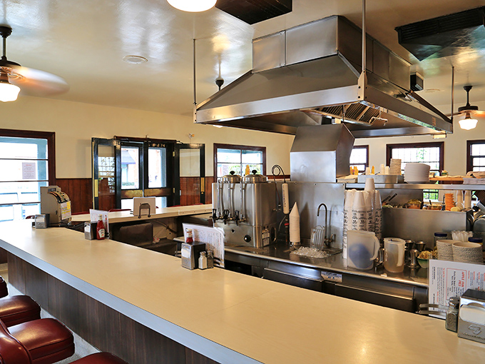 The horseshoe counter is where the magic happens – no fancy tables, no pretension, just front-row seats to a culinary performance that's been running longer than most Broadway shows.