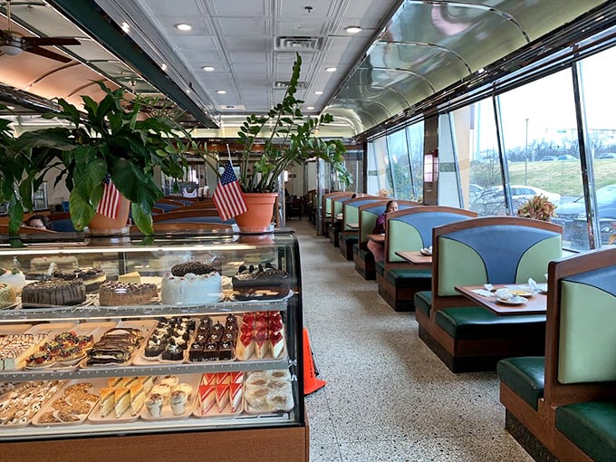Classic Americana meets modern comfort inside, where teal vinyl booths invite you to settle in for a feast while desserts tempt from their glass kingdom.