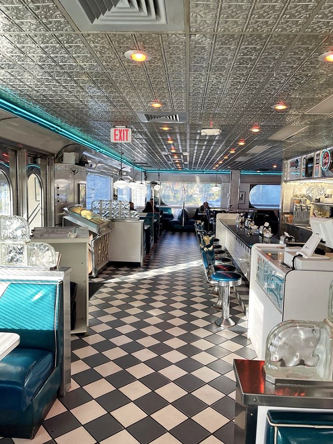Classic Americana in every detail—from the pressed tin ceiling to the checkerboard floor. This isn't just a diner; it's a time machine with table service.