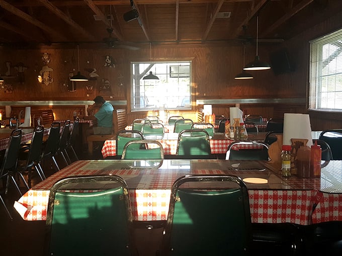 Red and white checkered tablecloths and green chairs create that perfect "we've arrived somewhere special" feeling that every great BBQ joint needs.
