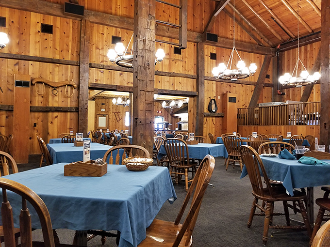 Rustic wooden beams and blue tablecloths create the perfect backdrop for comfort food memories. This isn't Instagram-engineered nostalgia – it's the real deal.