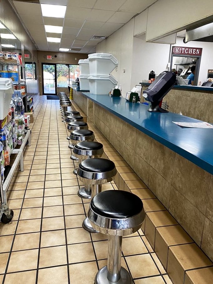 Classic counter seating that whispers, "Pull up a stool and stay awhile." This no-frills interior promises one thing: the focus is entirely on the food.
