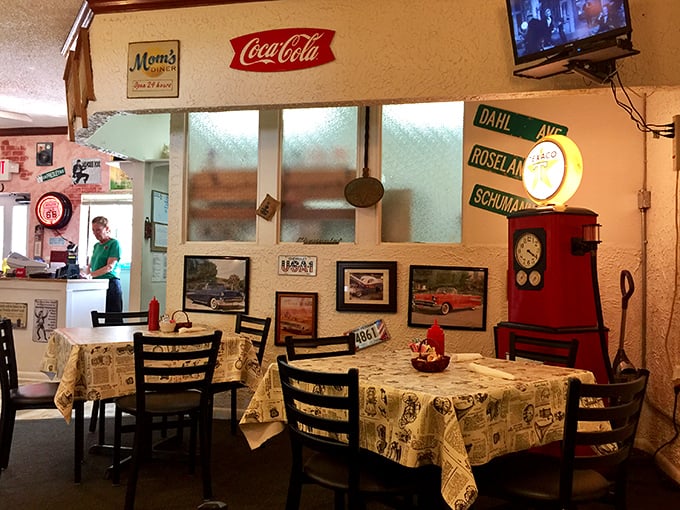 Vintage signs and newspaper tablecloths create that perfect "grandma's dining room meets local museum" vibe that no corporate restaurant could ever replicate.