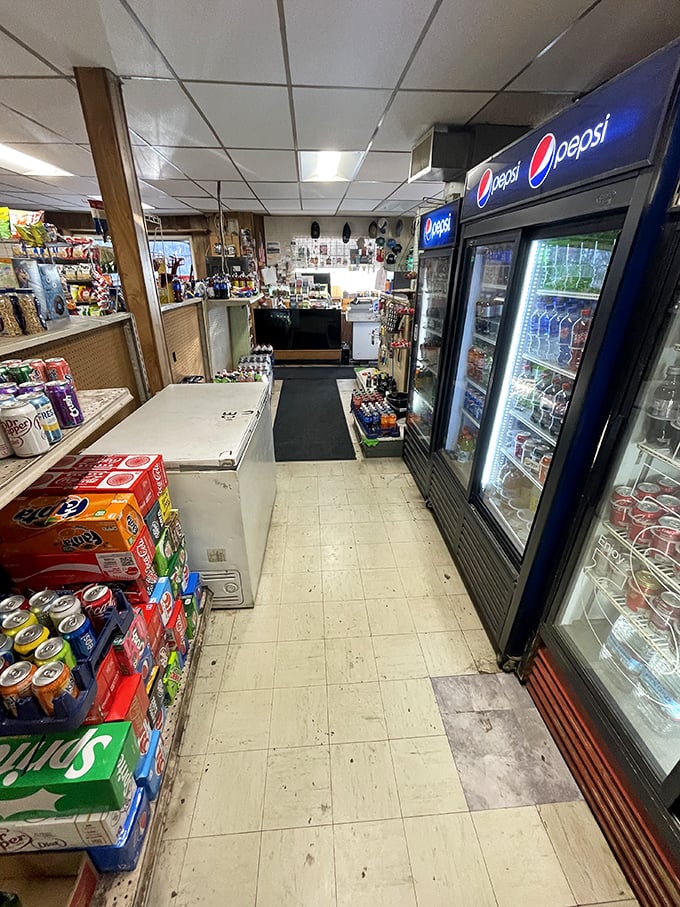 Step inside and time rewinds. The narrow aisles packed with essentials and cold drinks tell you this is the real deal—no Instagram-friendly redesign here.