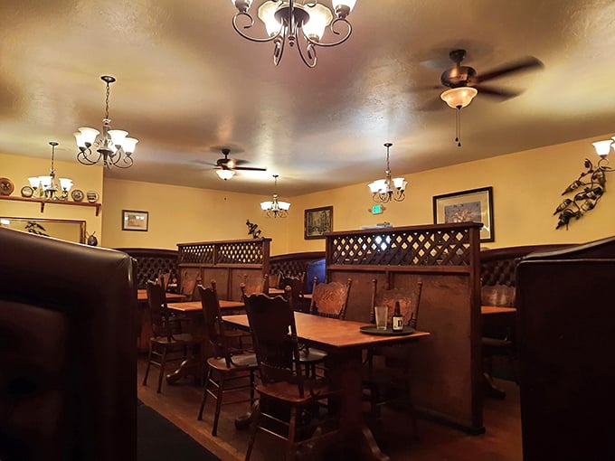 Wooden booths with lattice dividers create that perfect balance of privacy and community – like your own VIP section without the velvet rope.
