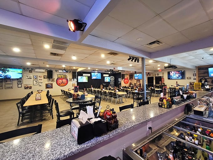 Inside, the spacious dining area offers a welcome surprise. The real spectacle isn't the TVs on the wall—it's what arrives on your tray.