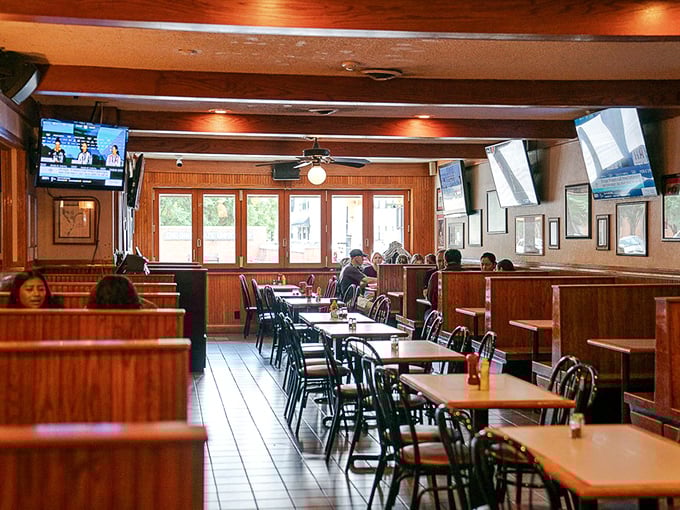 Wood paneling, comfortable booths, and strategically placed TVs—the sports bar trifecta perfected. The kind of place where memories are made between commercial breaks.