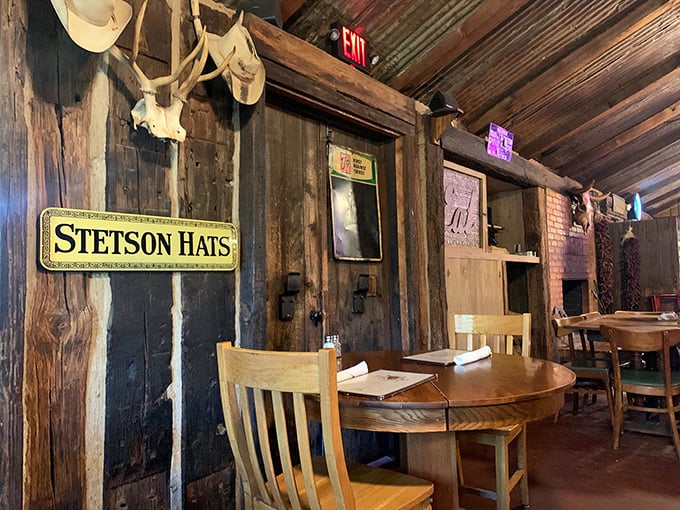 Cowboy hats and weathered wood create the perfect Texas tableau. This isn't décor from a catalog—it's authenticity you can feel in your bones.