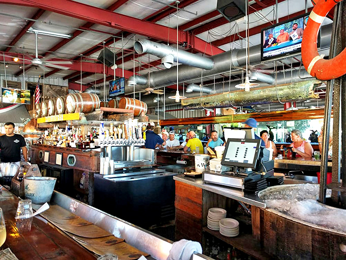 Where maritime history meets happy hour. Those wooden barrels hanging from the ceiling aren't just for show—they're storytellers.