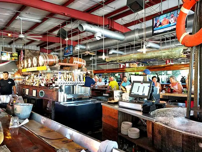 Where maritime history meets happy hour. Those wooden barrels hanging from the ceiling aren't just for show—they're storytellers.