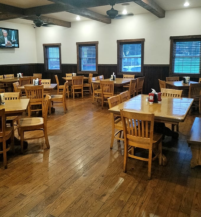 Warm wooden floors and sturdy tables create that perfect "everybody knows your name" vibe where comfort food memories are made.