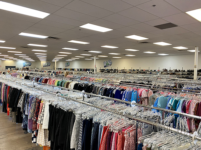 A sea of carefully organized clothing stretches as far as the eye can see, proving that "secondhand" and "spectacular" aren't mutually exclusive terms.