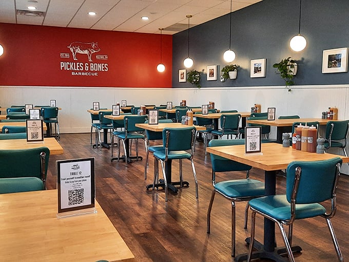Inside, teal chairs and warm wood tones create that perfect "stay awhile" vibe—casual enough for sauce-stained fingers, nice enough for date night.