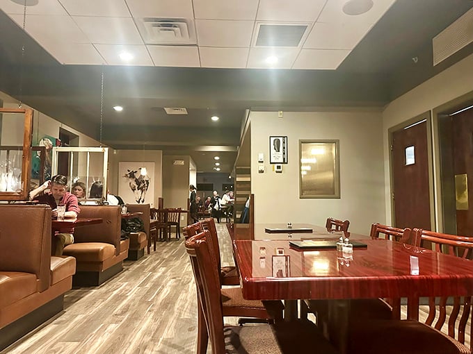 Warm wood tones and comfortable seating create that perfect "ahh, I've arrived" feeling that elevates a meal from dining to experience.
