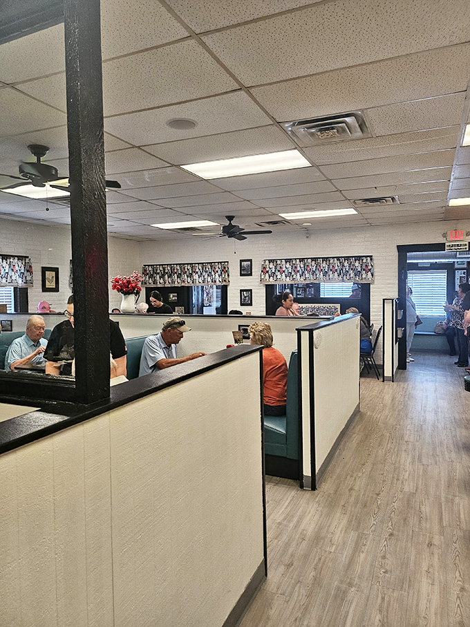 Inside, the classic diner layout with its booths and open dining room creates that perfect "everybody knows your name" atmosphere that chain restaurants spend millions trying to replicate.