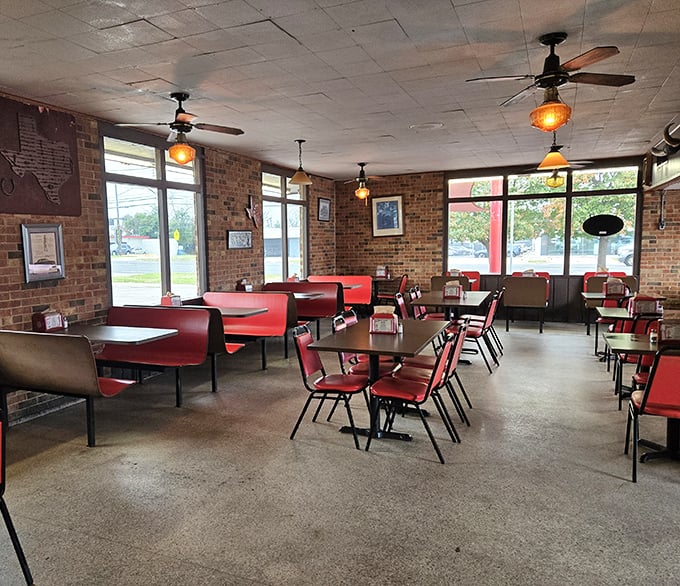 Red vinyl booths and exposed brick walls create the perfect backdrop for your burger pilgrimage. No Instagram filter needed—this is authentic vintage cool.