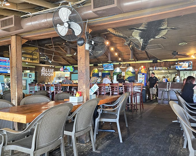 Where rustic meets refreshment. The interior blends casual comfort with Florida character, complete with ceiling fans and mounted catches telling tales of Lake Weir.