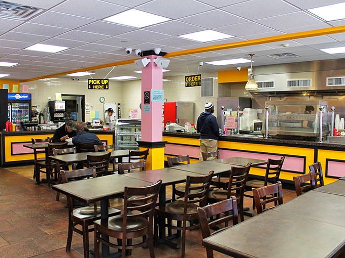 No-frills dining at its finest—where the focus stays squarely on the food. The pink and yellow interior is as bold as the flavors served.