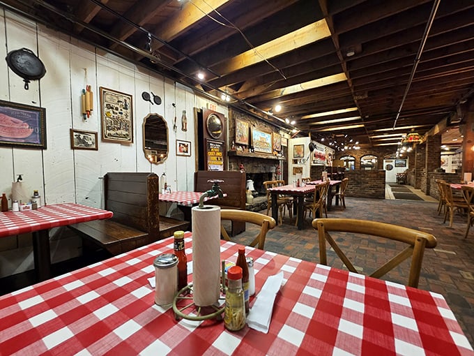 Red and white checkered tablecloths, exposed beams, and walls adorned with vintage treasures—this isn't manufactured nostalgia, it's the real Tennessee deal.