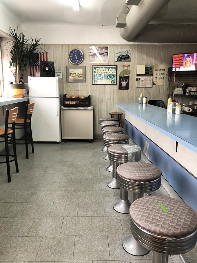 Classic diner stools await your arrival, like front-row seats to a culinary performance that's been running longer than most Broadway shows.