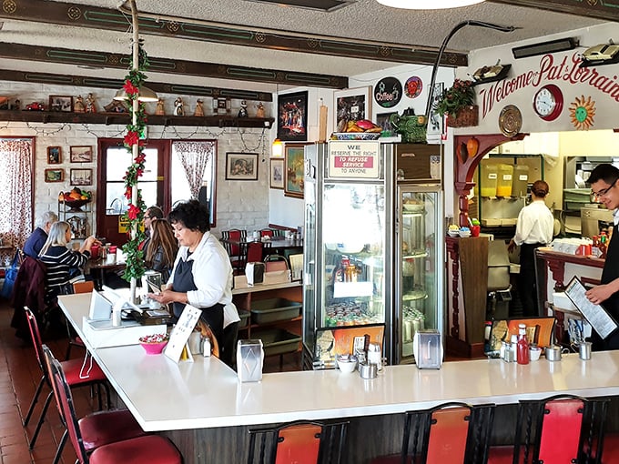Step inside where red vinyl booths and checkered floors create breakfast nostalgia that feels like home.