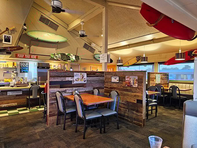 Surfboards suspended from the ceiling and rustic wood paneling create that perfect "vacation breakfast" atmosphere. Like Hawaii took a detour through Arizona.