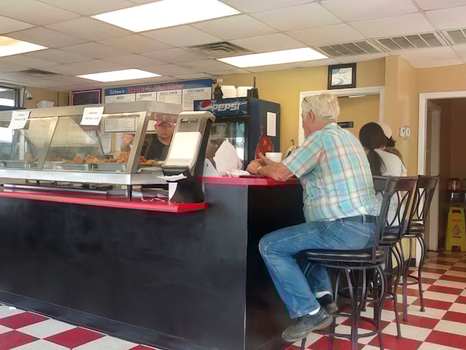 Counter culture at its finest – where locals perch on stools, trading stories while waiting for that golden-fried goodness.