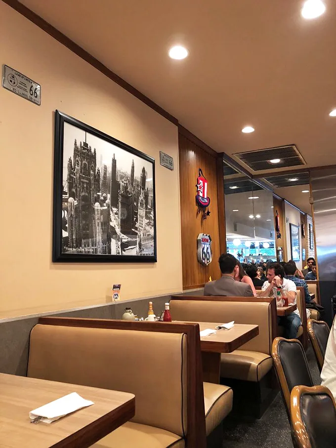 Classic diner booths where strangers become friends over coffee. The Route 66 memorabilia isn't manufactured nostalgia—it's earned its place on these walls.