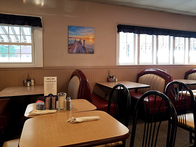 Classic diner comfort with booths that have cradled generations of hungry Ohioans. That lakeside sunset photo isn't just decor—it's a promise.