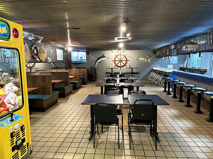 Nautical nostalgia meets no-nonsense dining. The ship wheel and fish decorations aren't from a designer catalog—they're the real deal, just like the food.