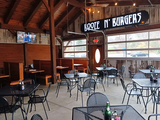 Inside, rustic meets refined with wooden beams and corrugated metal walls creating that perfect "I've discovered something special" atmosphere.