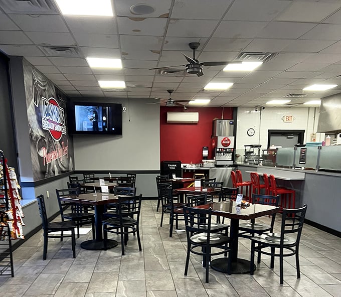 Simple, clean, and focused on what matters – the food. The red accents add warmth to a space where culinary magic happens daily.