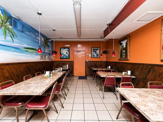 Simple wooden wainscoting and beach murals create that perfect "no-frills, all-flavor" atmosphere where the food rightfully becomes the star of the show.