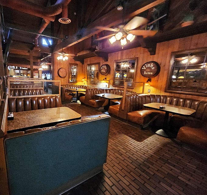 Step inside and you're transported to a warm, wood-paneled haven where leather booths have cradled generations of happy diners and their satisfied appetites.