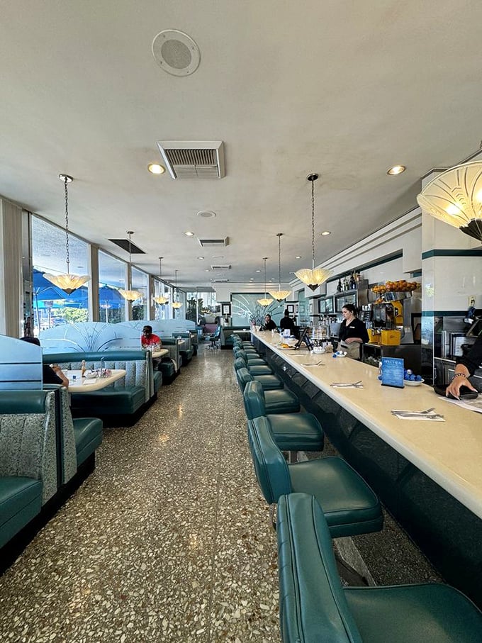 Classic diner perfection with turquoise vinyl booths and counter seating that whispers, "Stay awhile." The terrazzo floors have seen decades of happy diners.