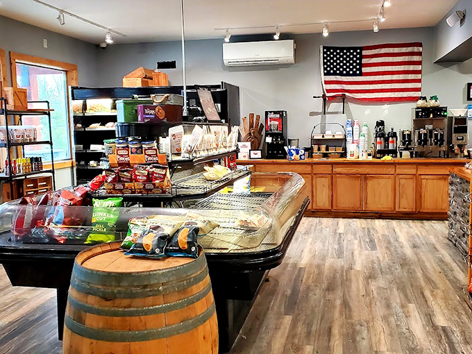 Inside, the American flag proudly watches over barrels of snacks and deli cases full of promise. This isn't just shopping—it's a patriotic duty to sample everything.