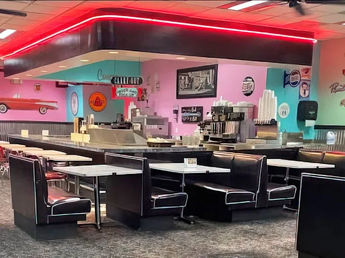 Step inside and the technicolor dream begins—pink walls, turquoise accents, and a counter that's seen more stories than a library.