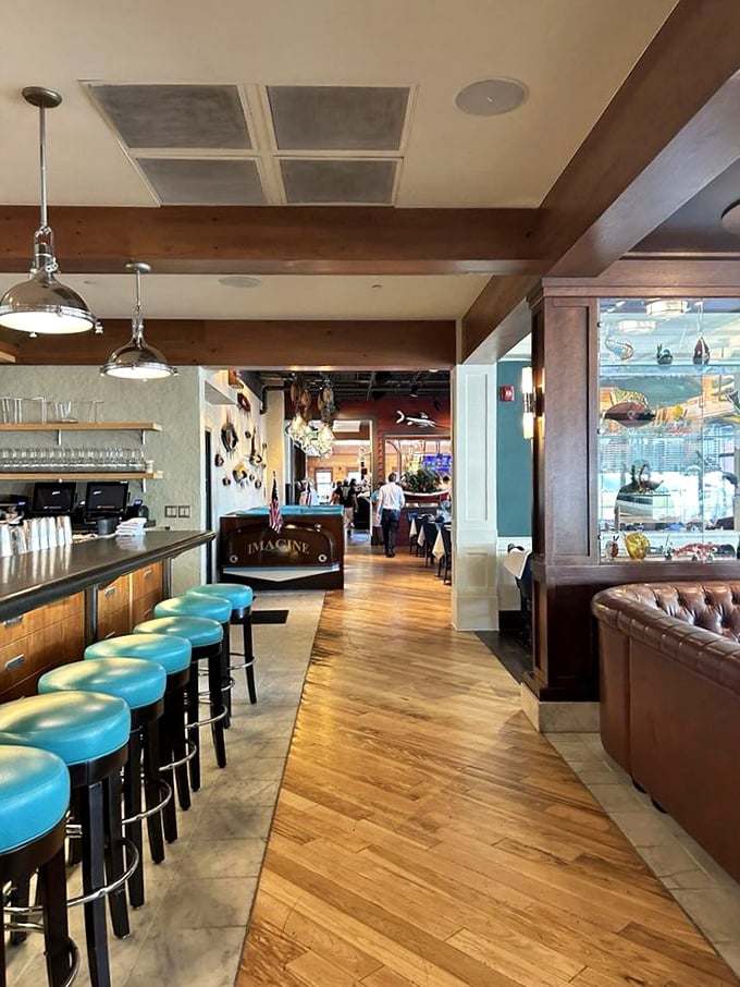 Polished wood, aqua accents, and maritime elegance—the interior feels like stepping aboard a luxury yacht where calories simply don't count.