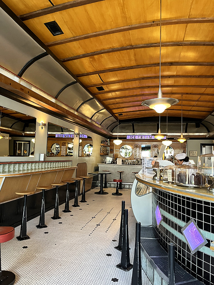 Step inside and the curved wooden ceiling embraces you like a warm hug from the 1930s. Time travel never tasted so sweet.