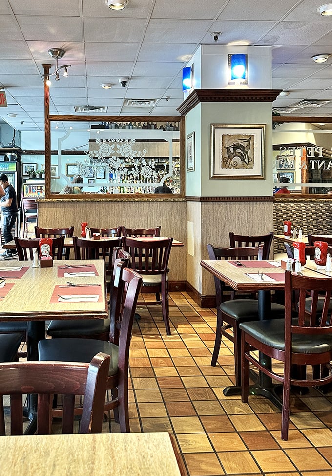 Classic diner aesthetics meet timeless comfort at Little Pete's interior. Those wooden chairs have supported more happy diners than a Phillies championship parade.