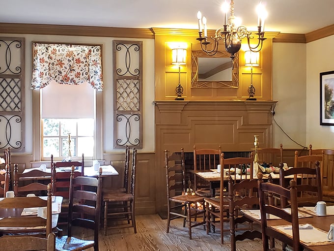 Colonial charm meets comfort in this dining room. Those ladder-back chairs have witnessed countless "mmms" and "oh my goodness" moments from satisfied diners.