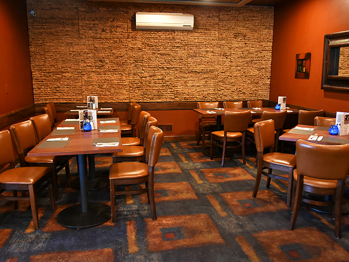 Warm brick walls and leather seating create that classic supper club ambiance where time slows down and conversations flow as smoothly as the cocktails.
