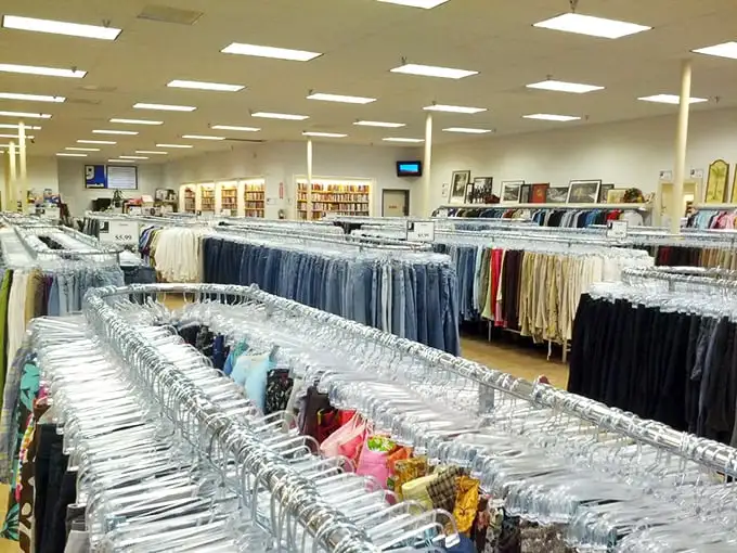 Rows upon rows of meticulously organized clothing create a retail wonderland that would make Marie Kondo weep with organizational joy.